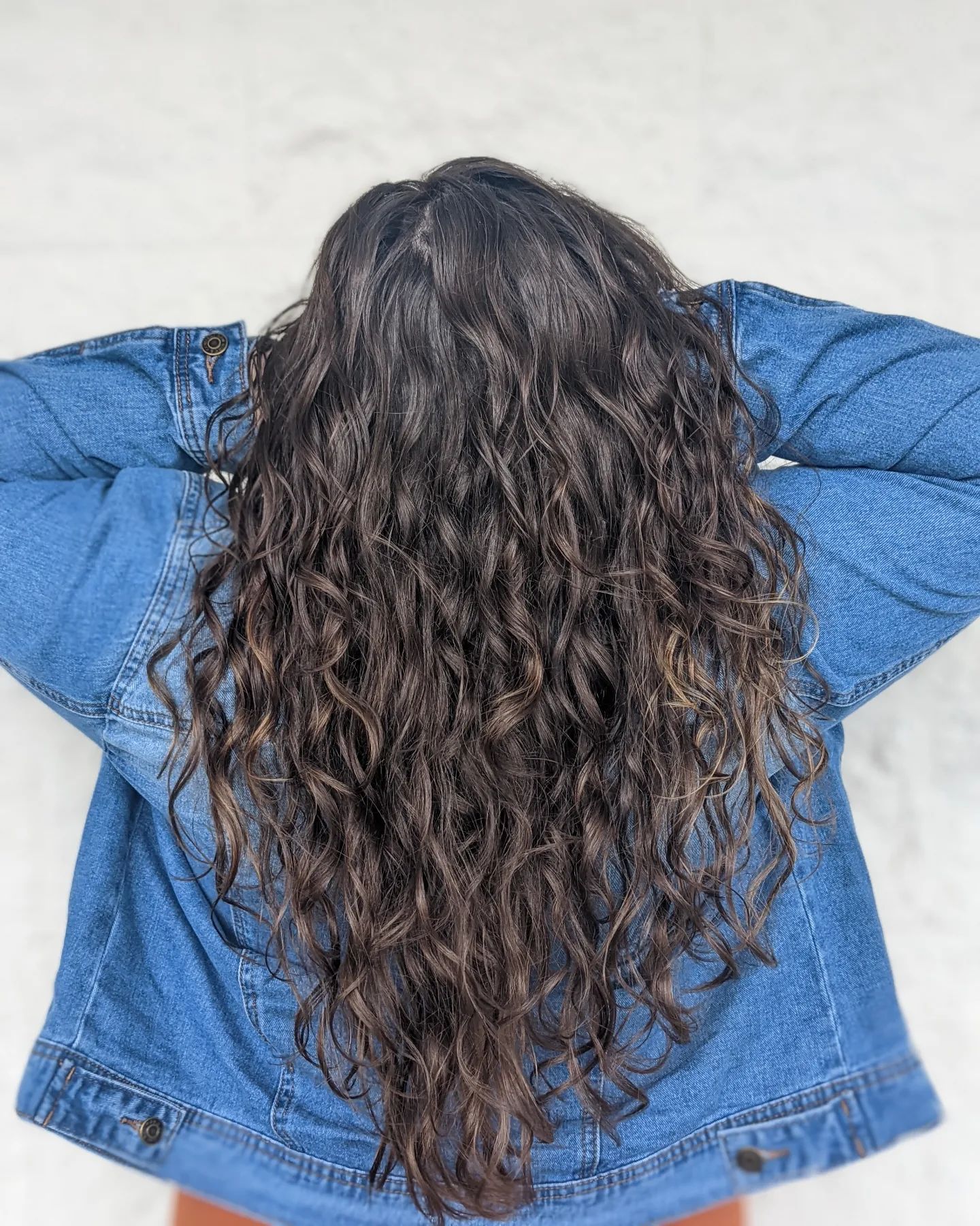 Step Cut Hairstyle For Curly Hair Back View